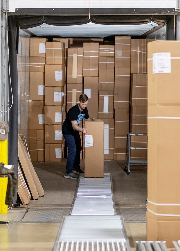 Accelerate Truck Loading and Unloading with Gravity Conveyors